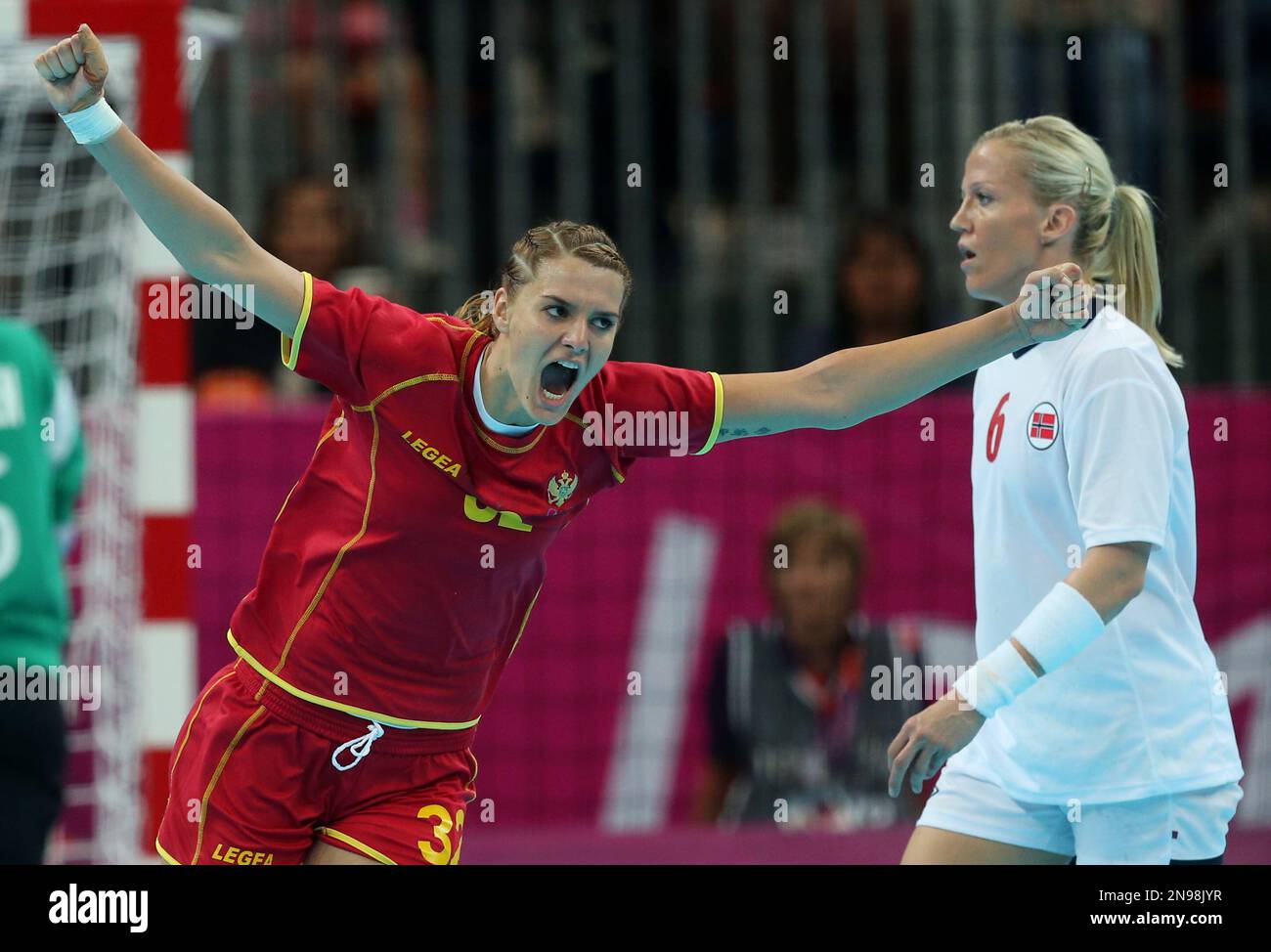 Norway's Heidi Loke, right, looks on as Montenegro's Katarina Bulatovic ...