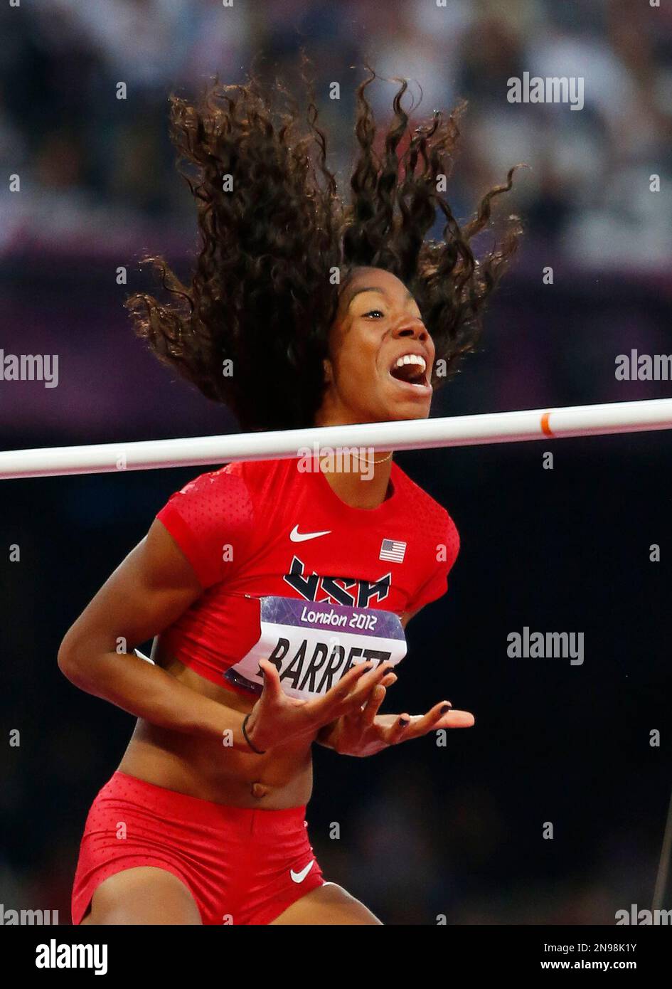 United States' Brigetta Barrett reacts as she clears the bar to win ...