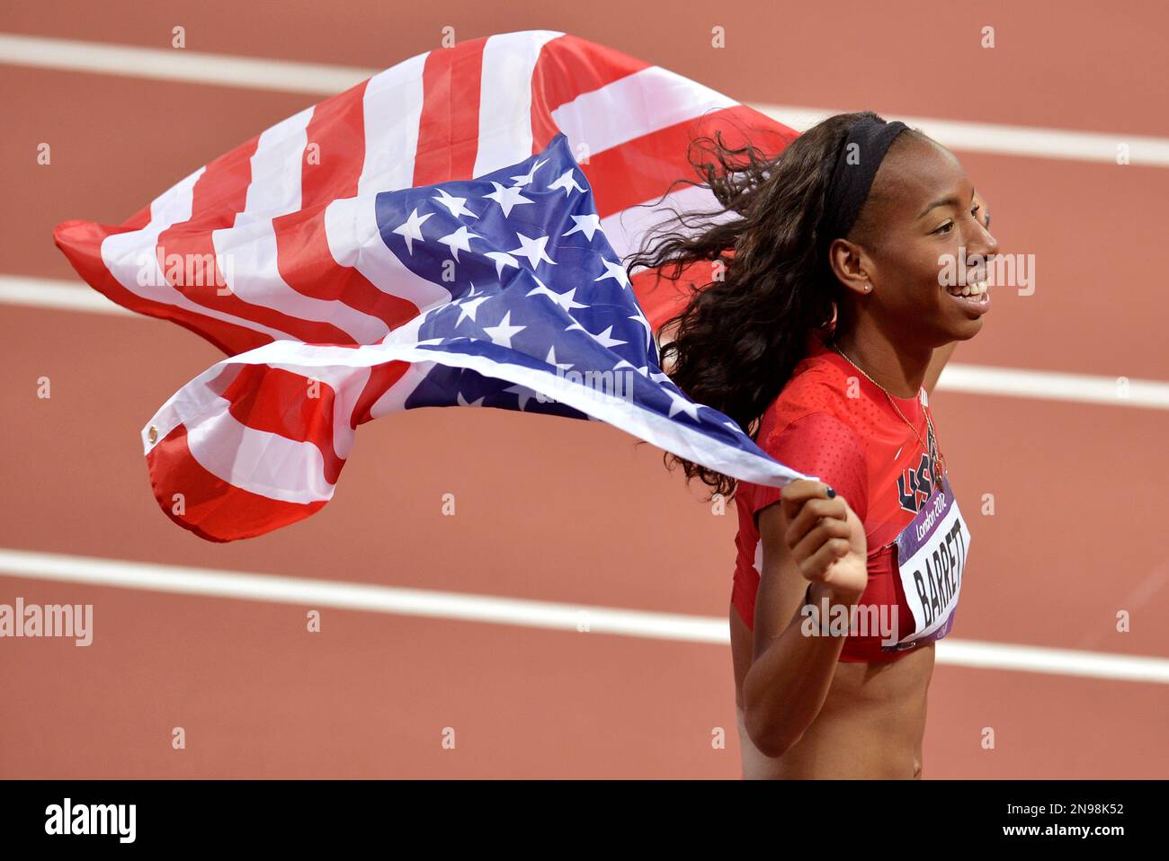 United States' Brigetta Barrett celebrates after winning a silver medal ...