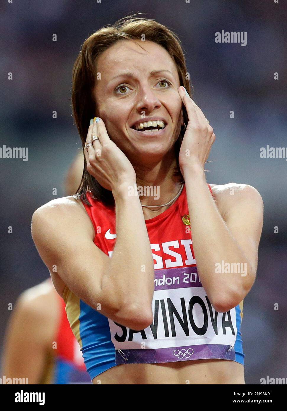 Russia's Mariya Savinova reacts after winning the women's 800-meter ...
