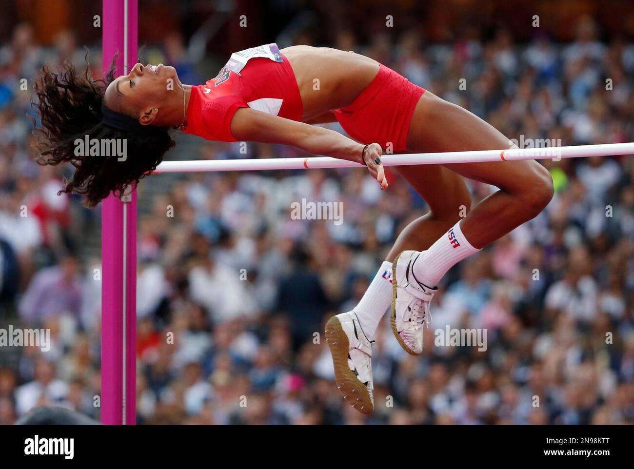 United States' Brigetta Barrett clears the bar in the women's high jump ...