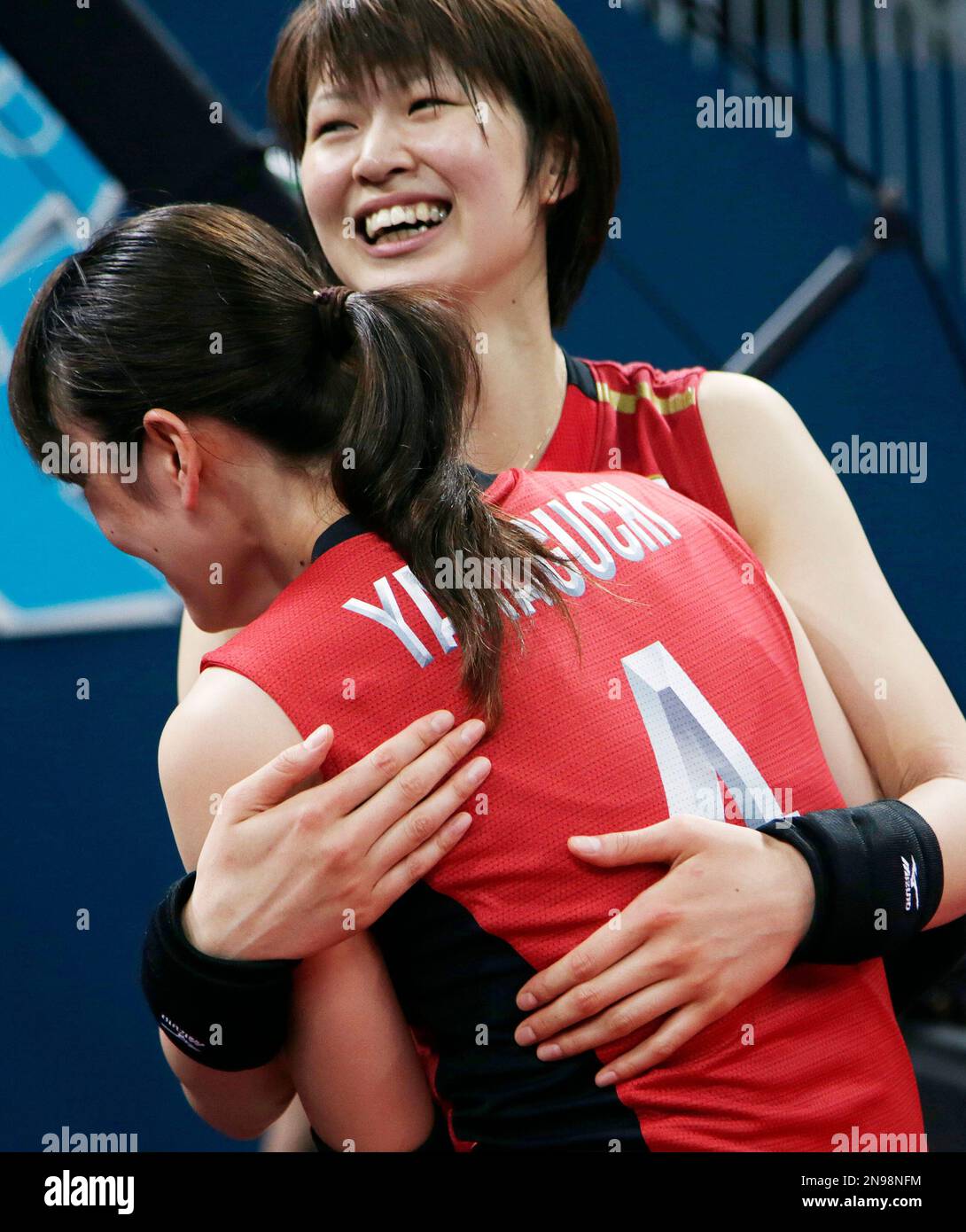 Japan's Saori Kimura, rear, hugs Mai Yamaguchi following a three set ...