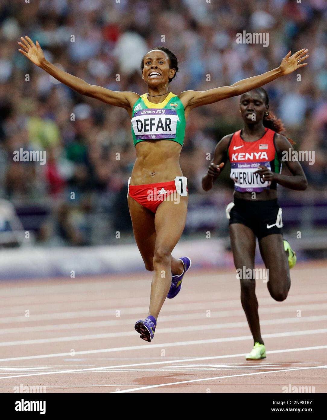 Ethiopia's Meseret Defar celebrates winning gold in the women's 5000 ...