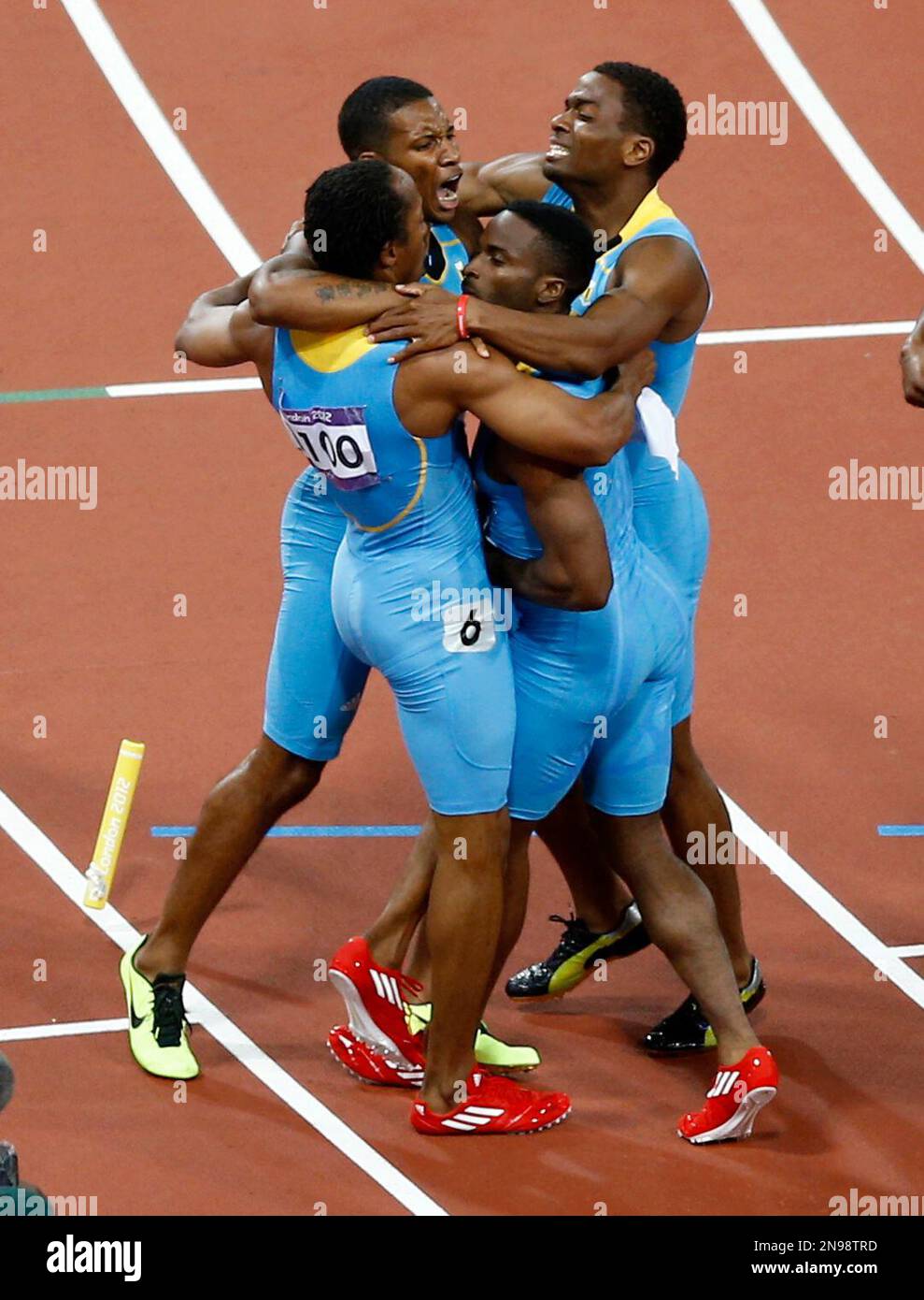 Bahamas' men's 4x400-meter relay team members Chris Brown, left ...