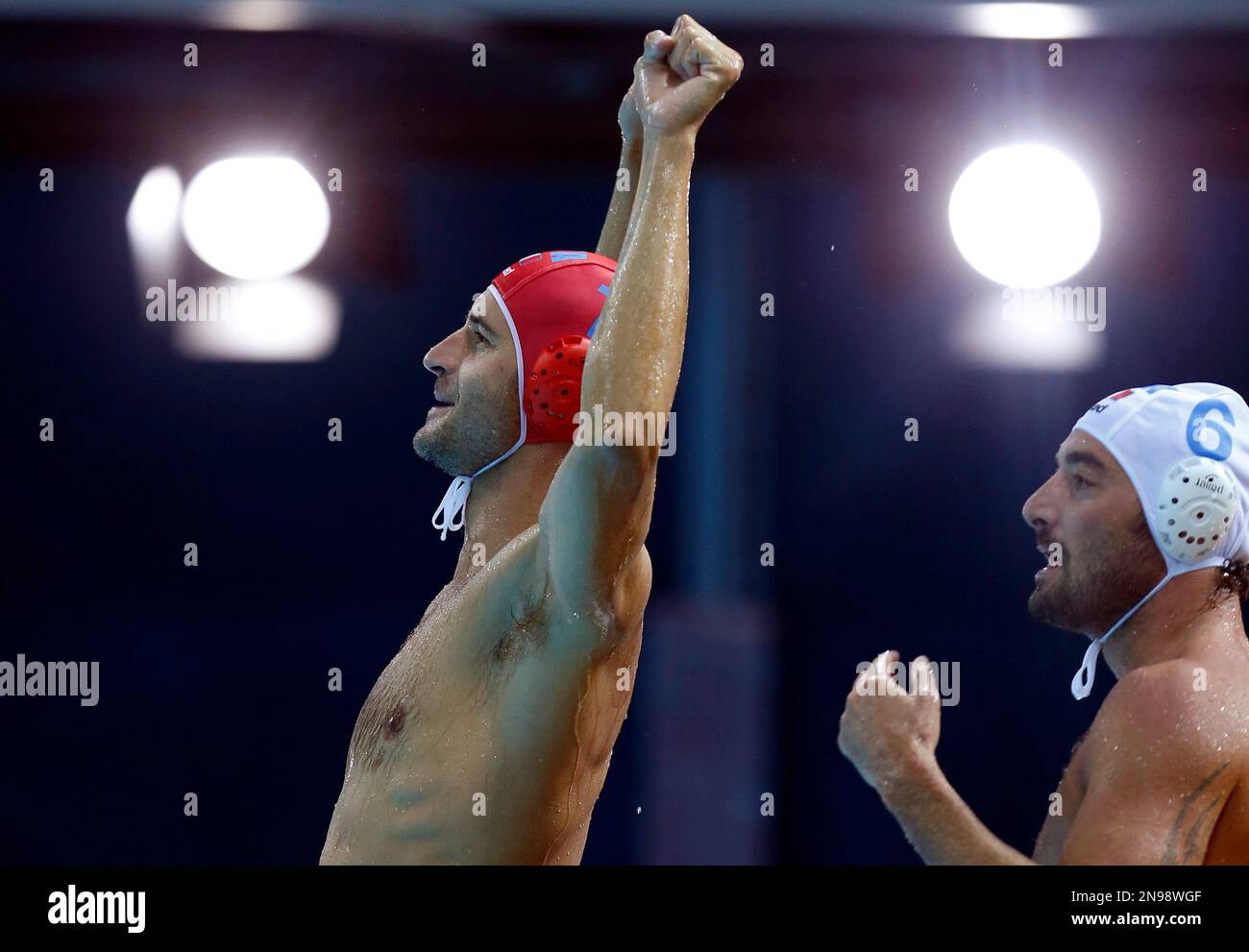 Italy goalkeeper Stefano Tempesti, left, celebrates with teammate ...