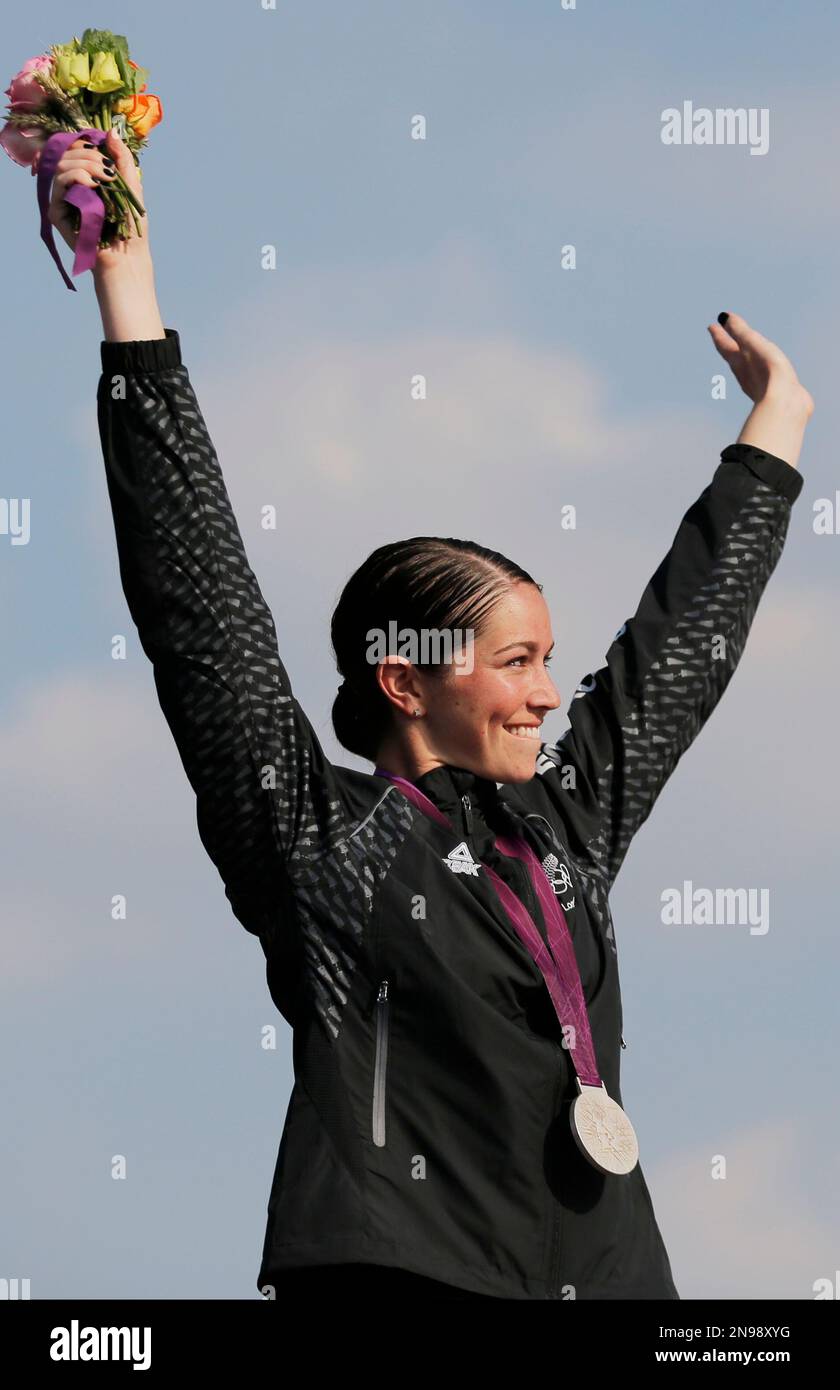 New Zealand's Sarah Walker celebrates winning the silver medal in women ...