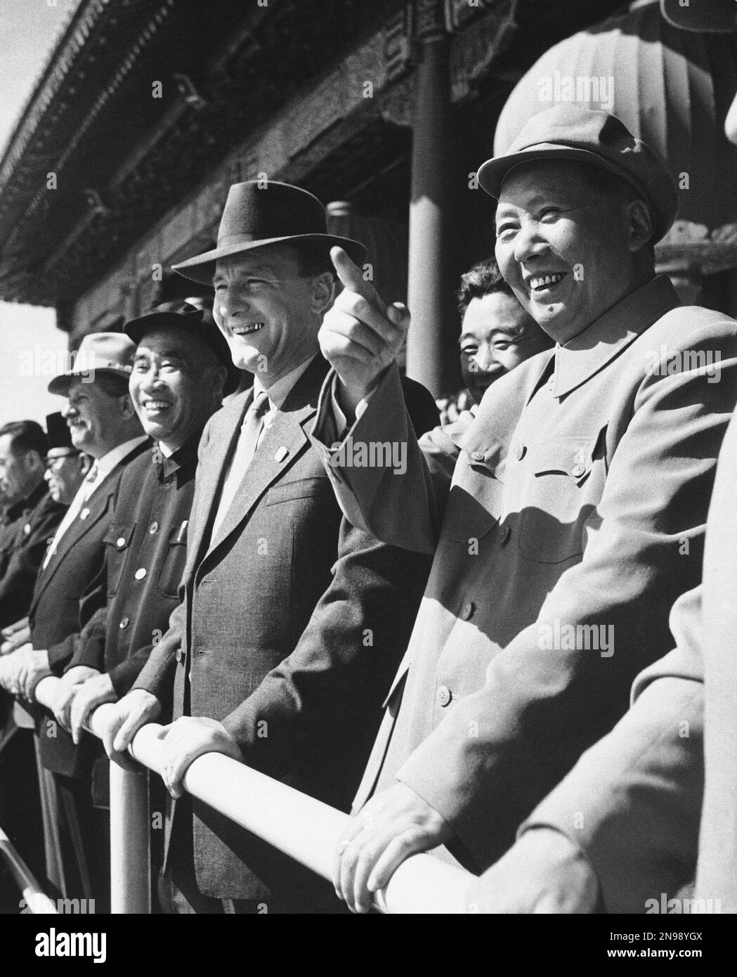 Communist China's boss, Mao Tse-Tung,right, points with a smile as he ...