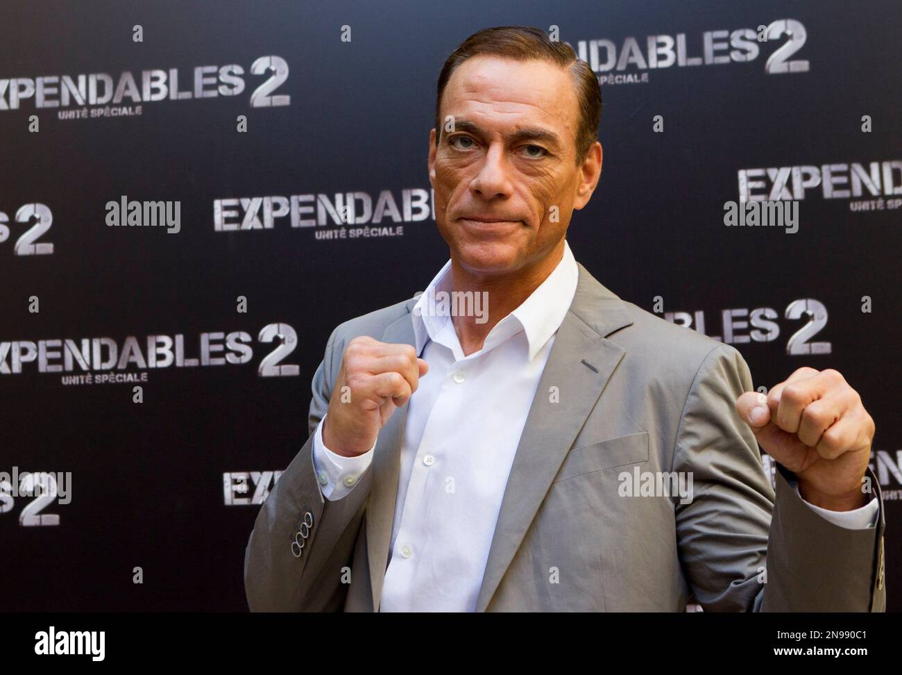 Belgian actor Jean-Claude Van Damme poses for the photographers during ...