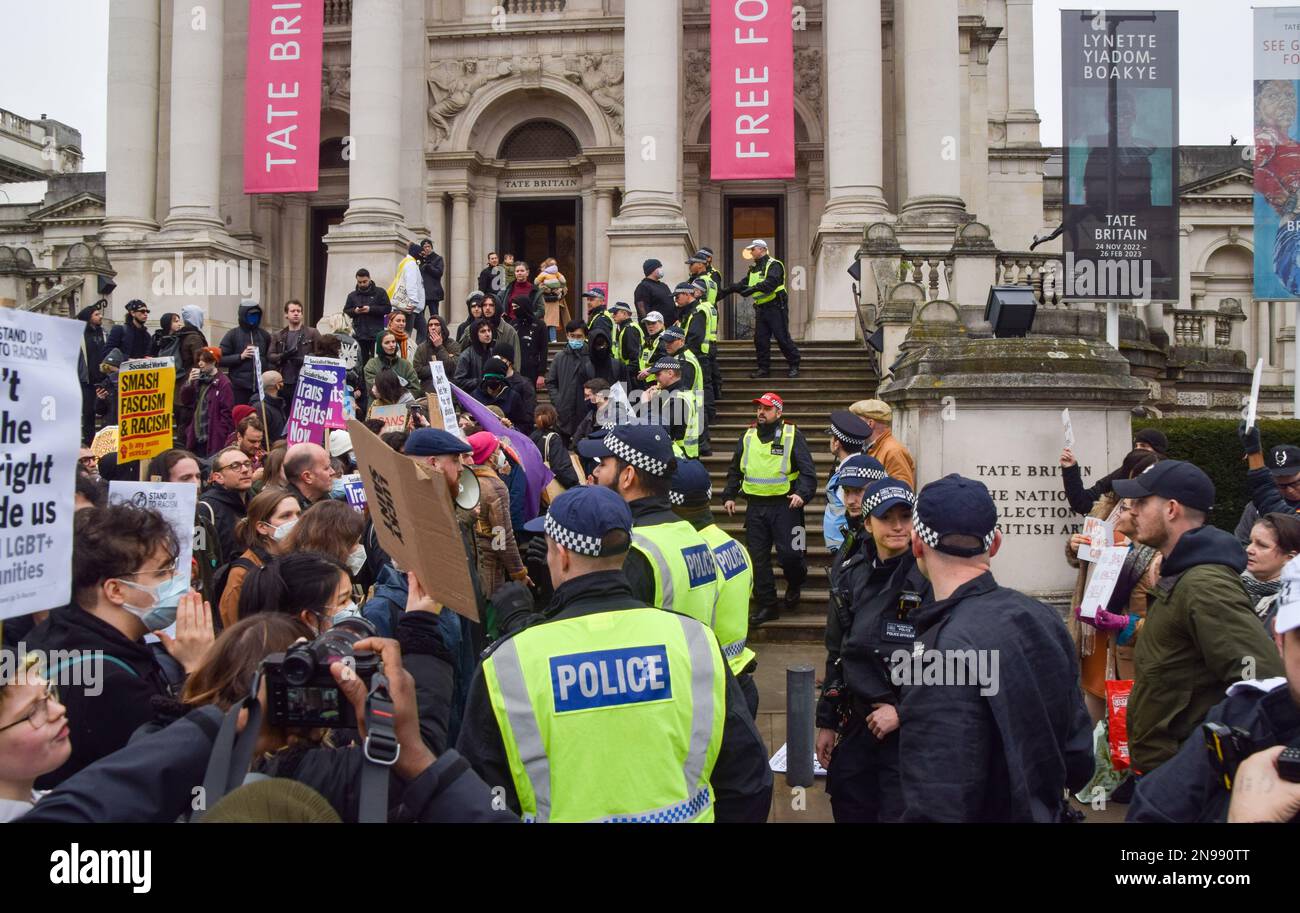 London, UK. 11th February 2023. Riot police move in to separate ...