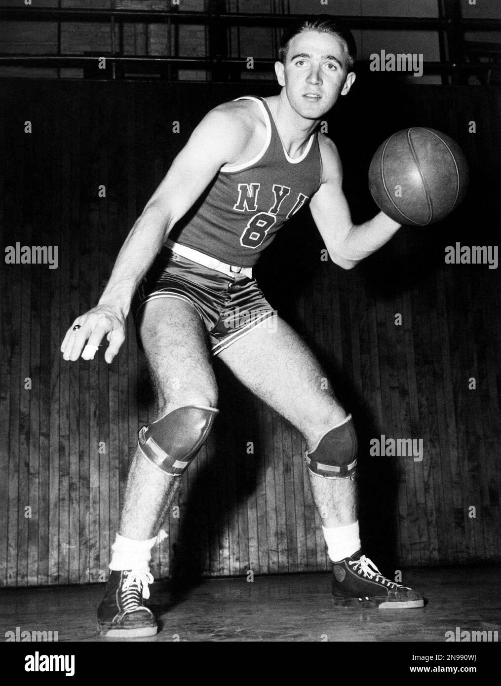 FILE - This 1946 file photo shows New York University basketball player ...