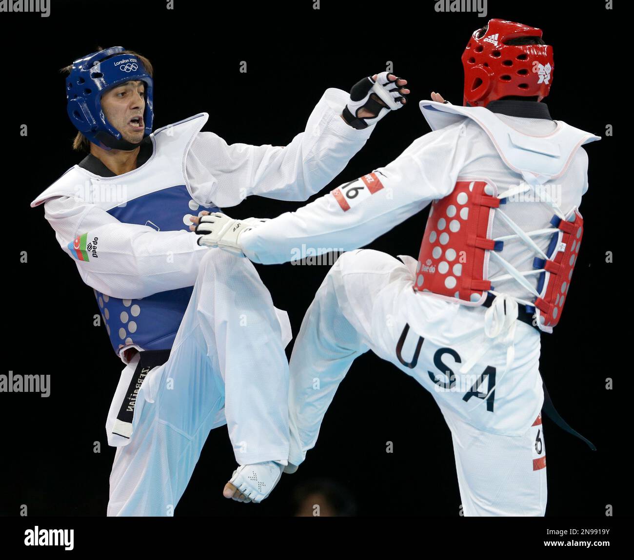 Azerbaijan's Ramin Azizov fights United States' Steven Lopez (in red ...
