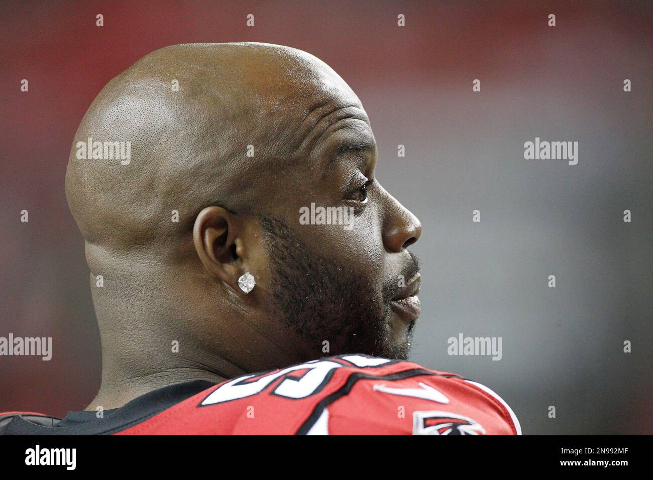 Atlanta Falcons defensive end John Abraham (55) speaks to teammates ...