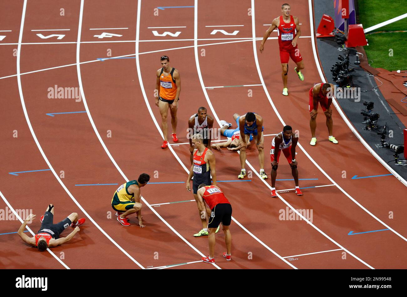 Decathletes rest after their 1500-meter heat during the athletics in ...