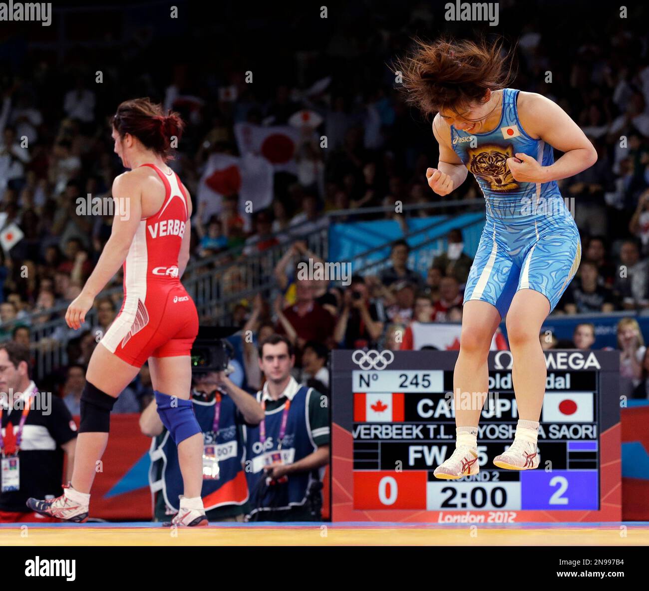 Saori Yoshida of Japan celebrates after she beat Tonya Lynn Verbeek of ...