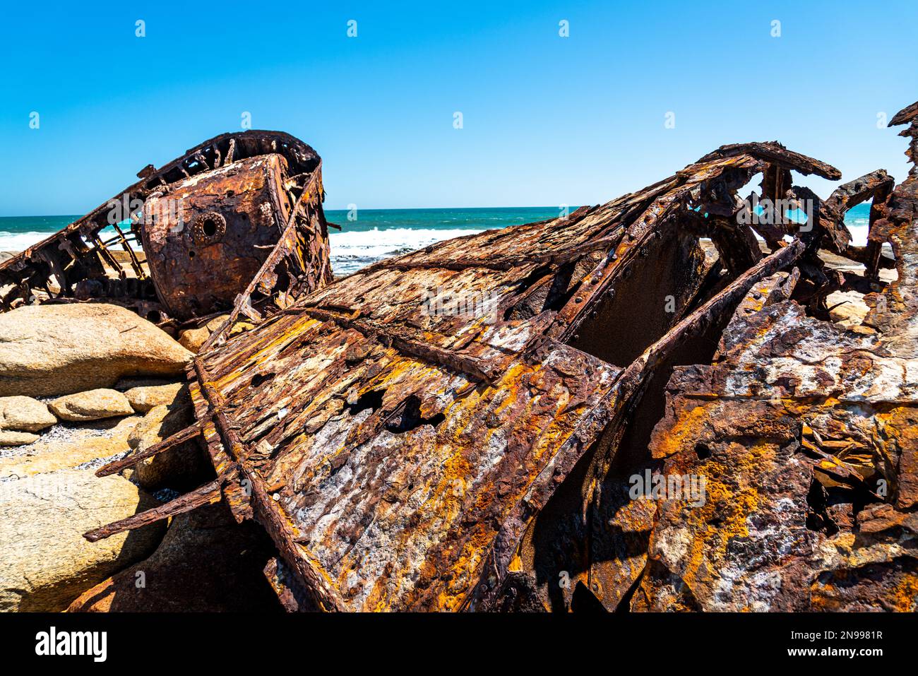 The wreck of the Aristea lies on the rocks on the Atlantic Ocean coast ...