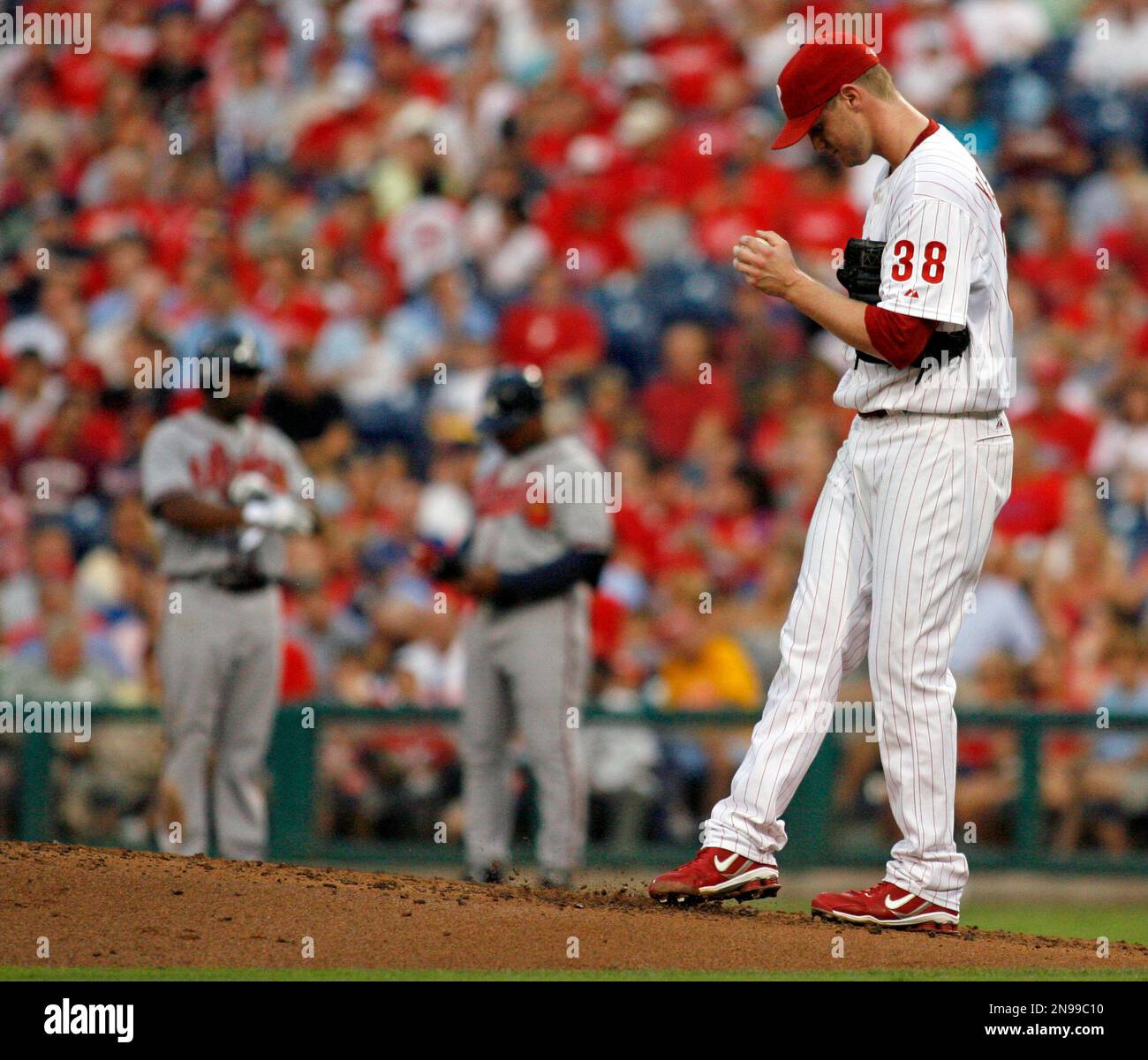 Philadelphia Phillies starting pitcher Kyle Kendrick kicks the mound ...