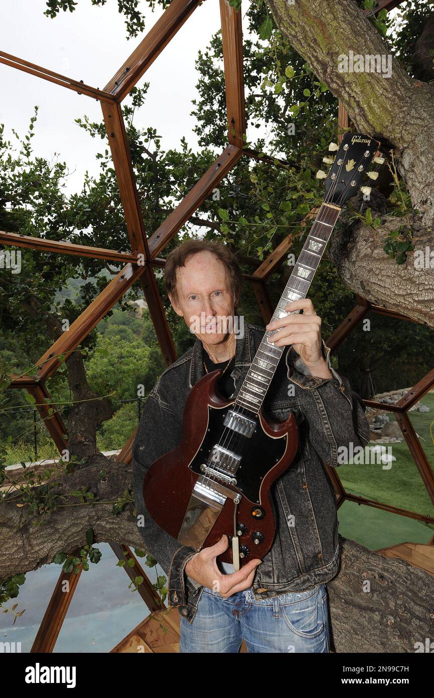 Robby Krieger poses for a portrait in his custom built treehouse built ...