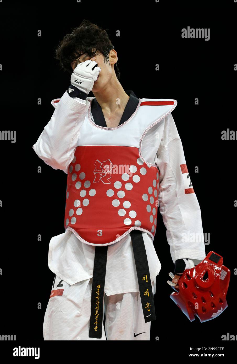 South Korea's Lee Dae-hoon reacts after losing to Spain's Joel Gonzalez ...