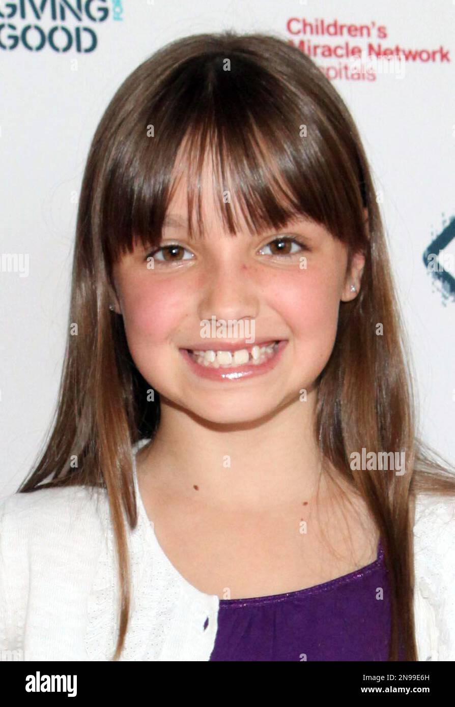 Mackenzie Aladjem poses for a photo at the Xbox 360 and Children's ...