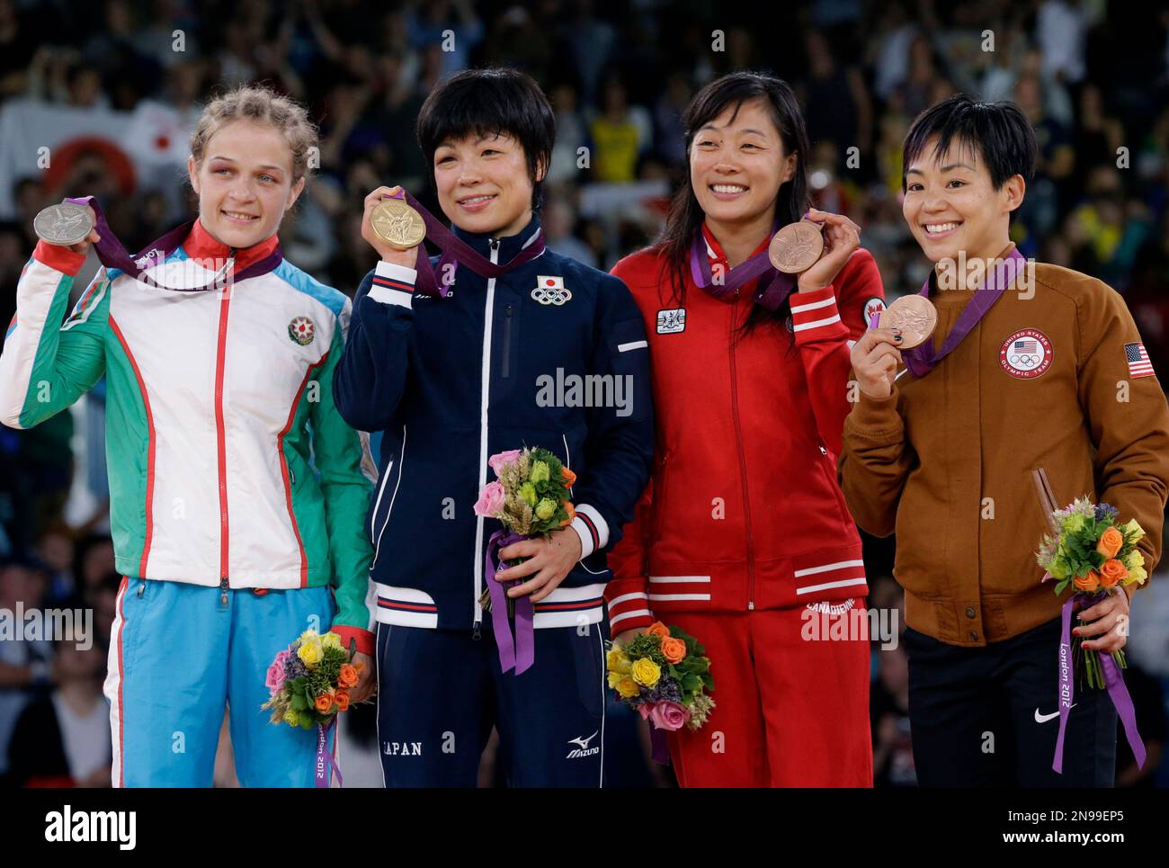 From left, silver medalist Mariya Stadnyk of Azerbaijan, gold medalist ...