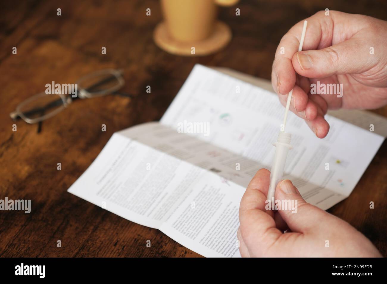 close-up of person using corona virus covid-19 rapid antigen self test ...