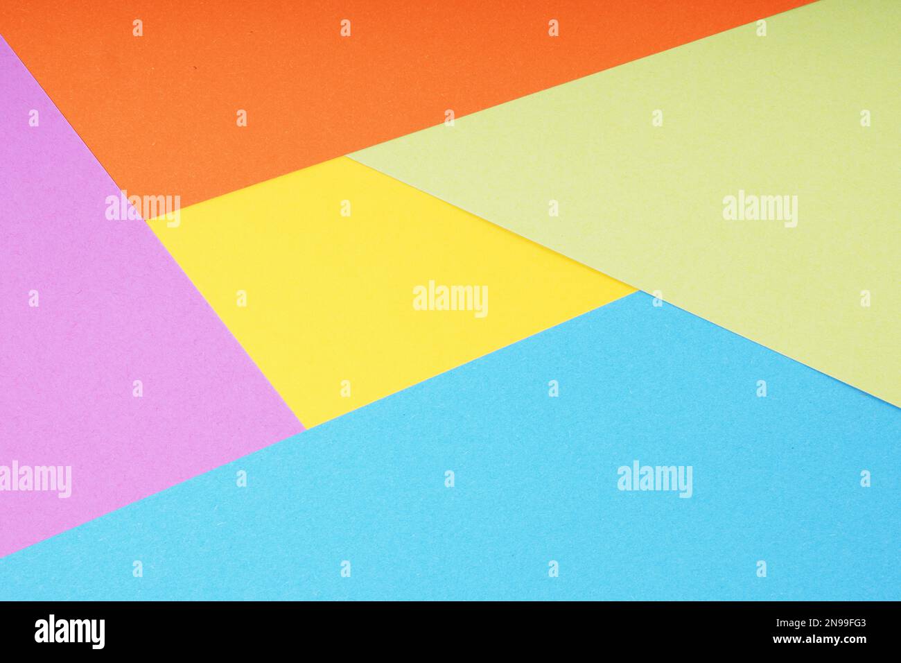 multicolor paper background with five different colors in triangle and ...