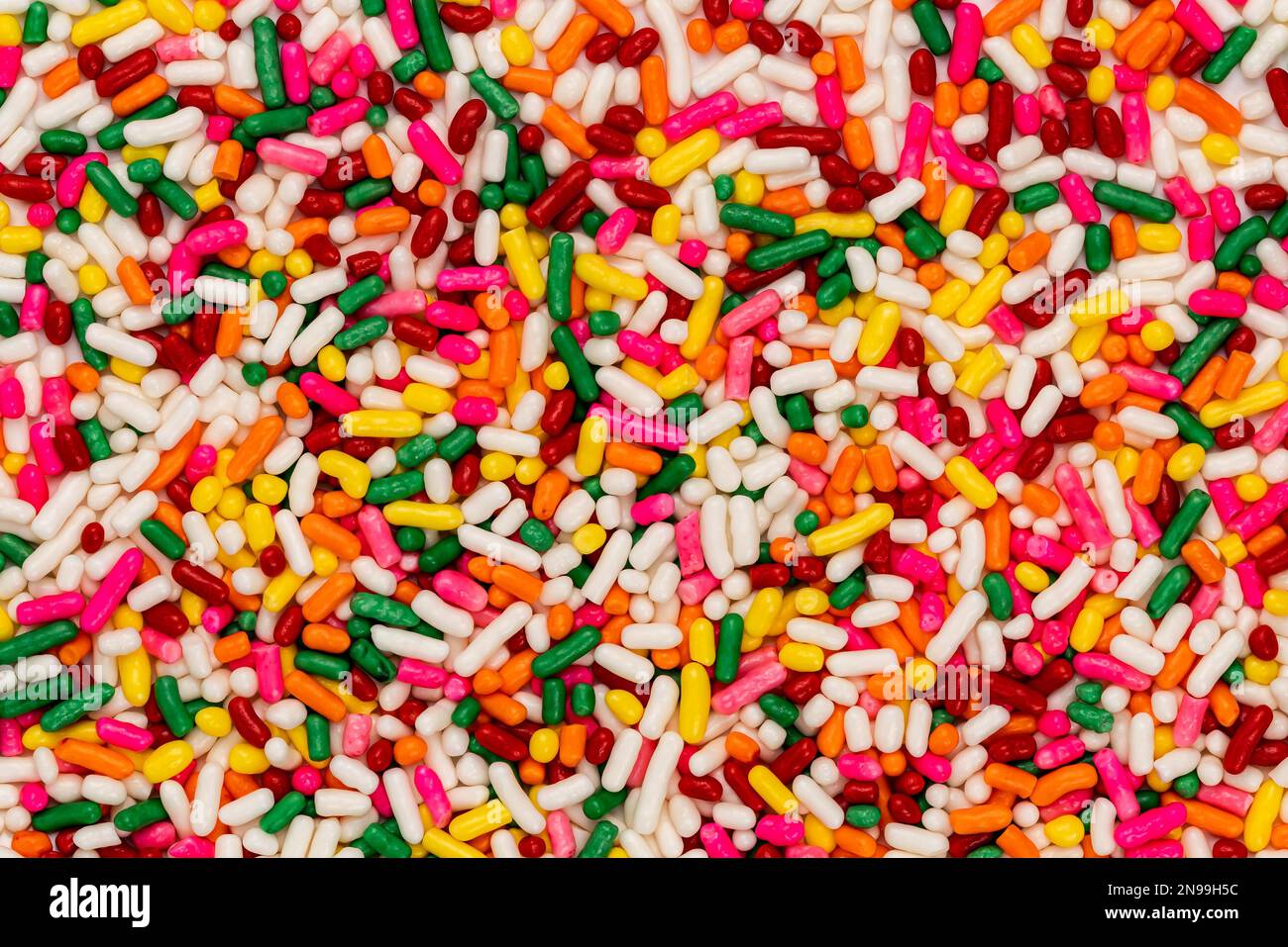 Top view closeup colorful rainbow candy sprinkles on the floor Stock ...