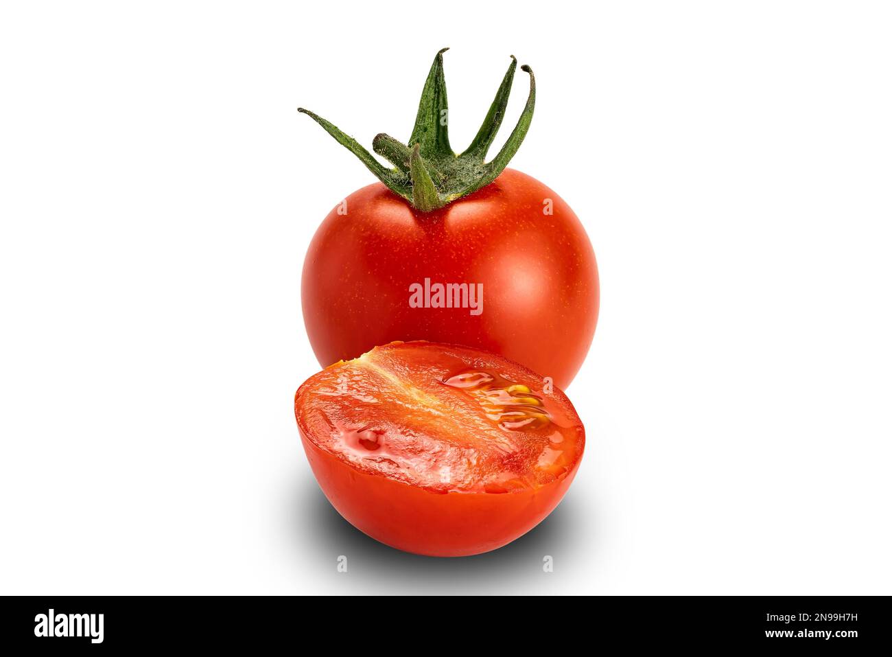 Side view a whole and a half of ripe cherry tomato on white background ...