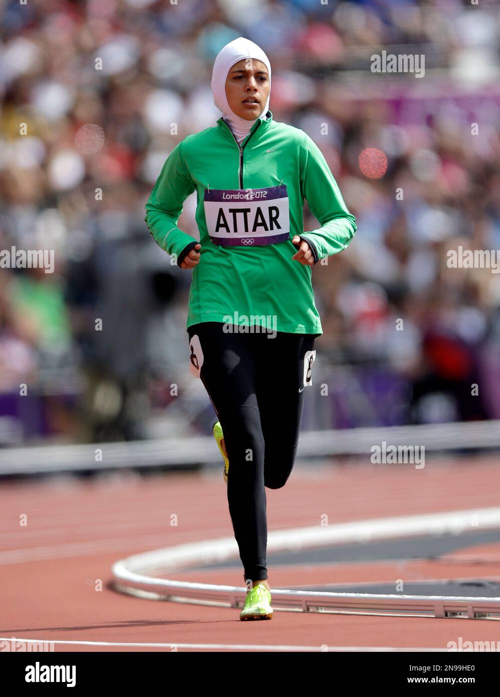 Saudi Arabia's Sarah Attar competes in a women's 800-meter heat during ...