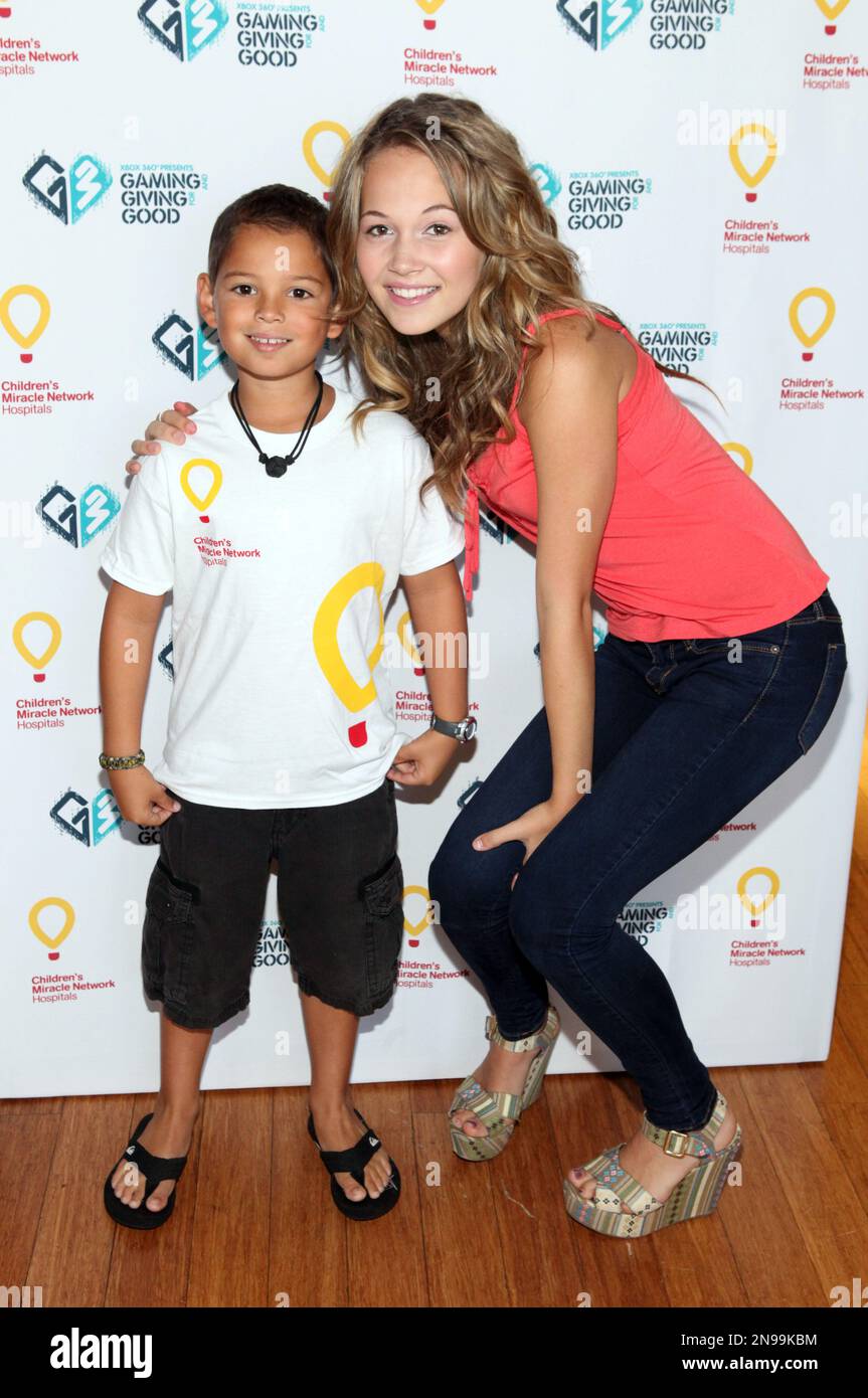 Commercial Image - Kelli Berglund poses for a photo with CHOC patient ...