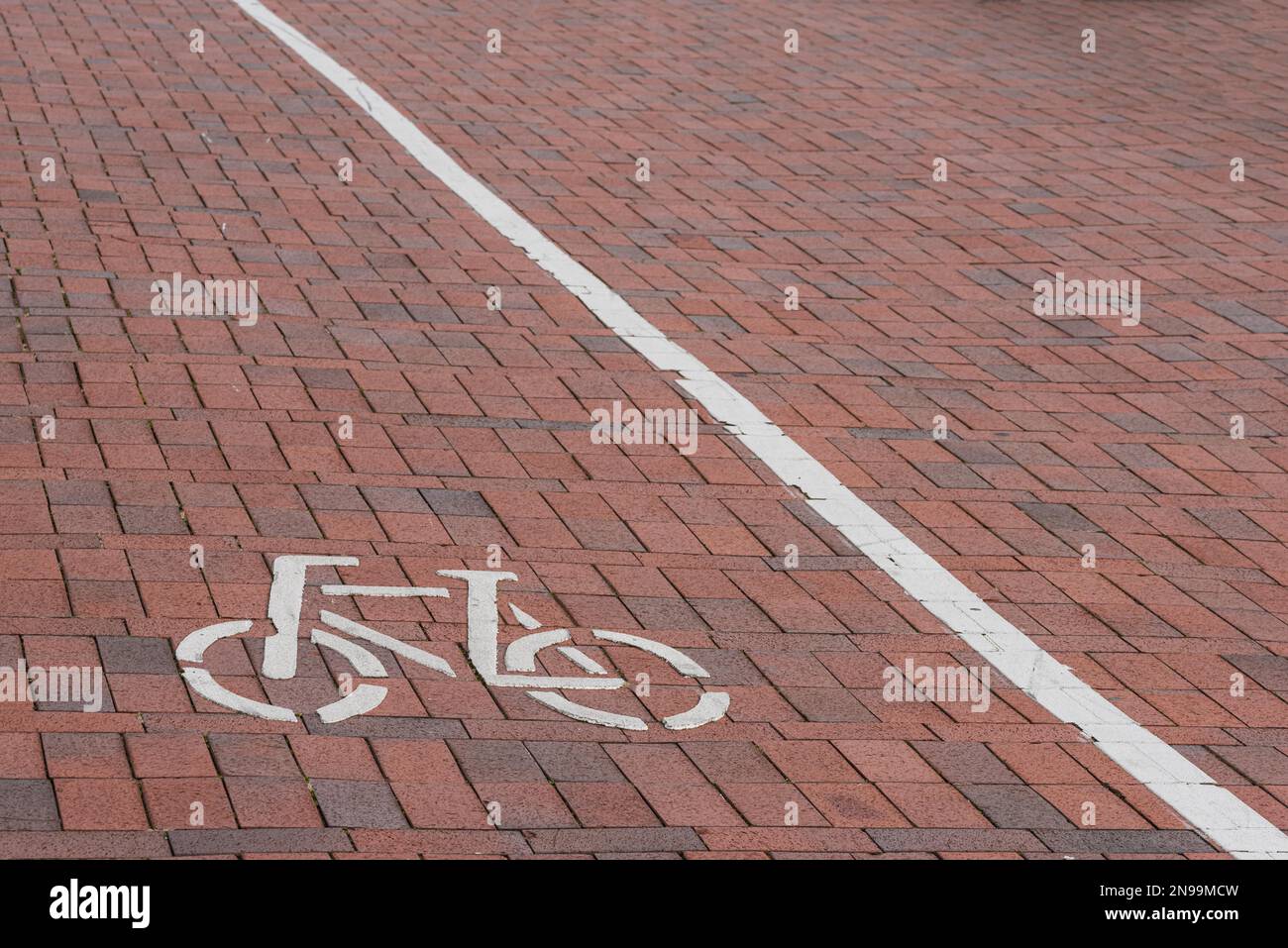 bike lane on road, bike path with pictogram Stock Photo - Alamy