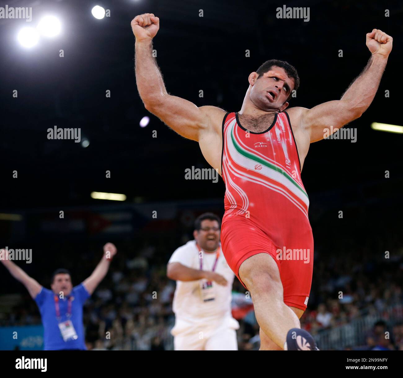 Iran's Ghasem Gholamreza Rezaei reacts after defeating Russia's Rustam ...