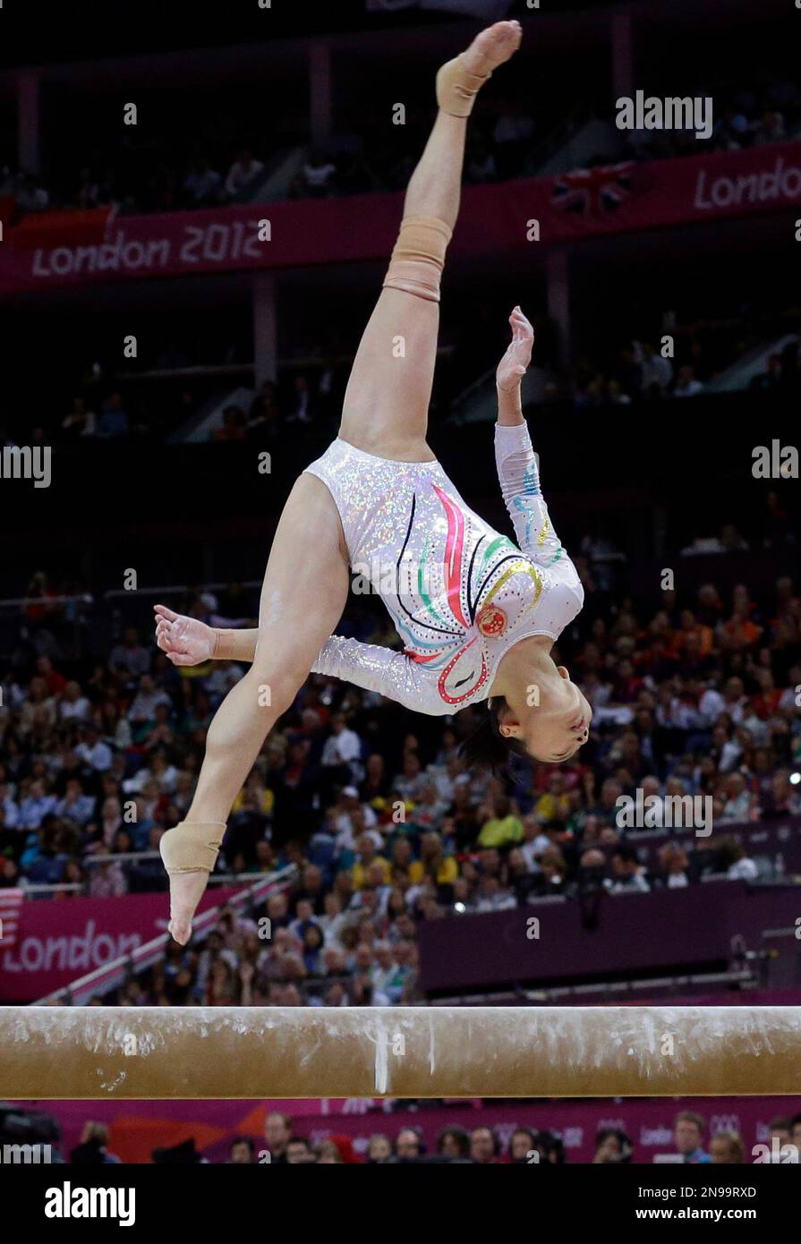 Chinese gymnast Deng Linlin performs on the balance beam during the ...