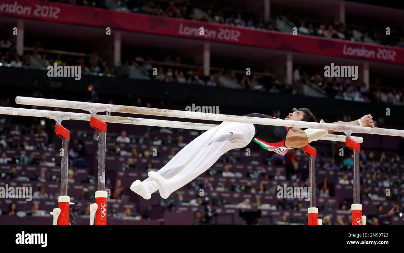 Mexico's Daniel Corral Barron performs on the parallel bars during the ...