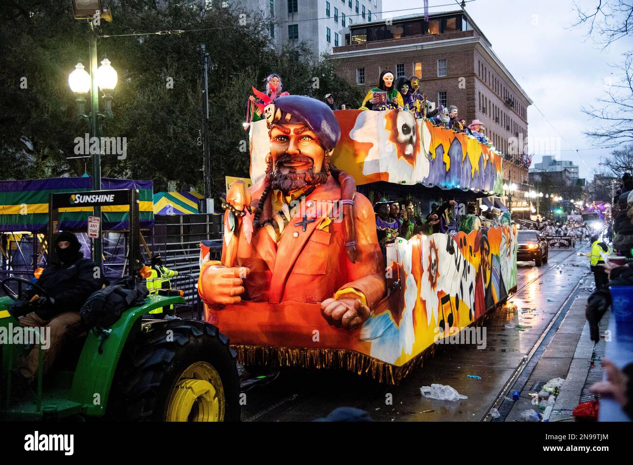 Members of the Krewe of Freret parade are seen as they pass mayoral ...