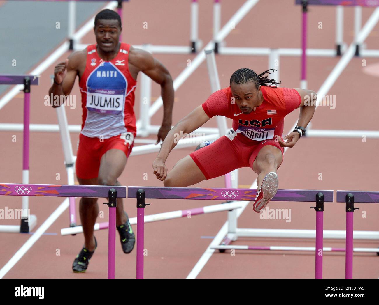 United States' Aries Merritt leads Honduras' Jeffrey Julmis in a men's ...
