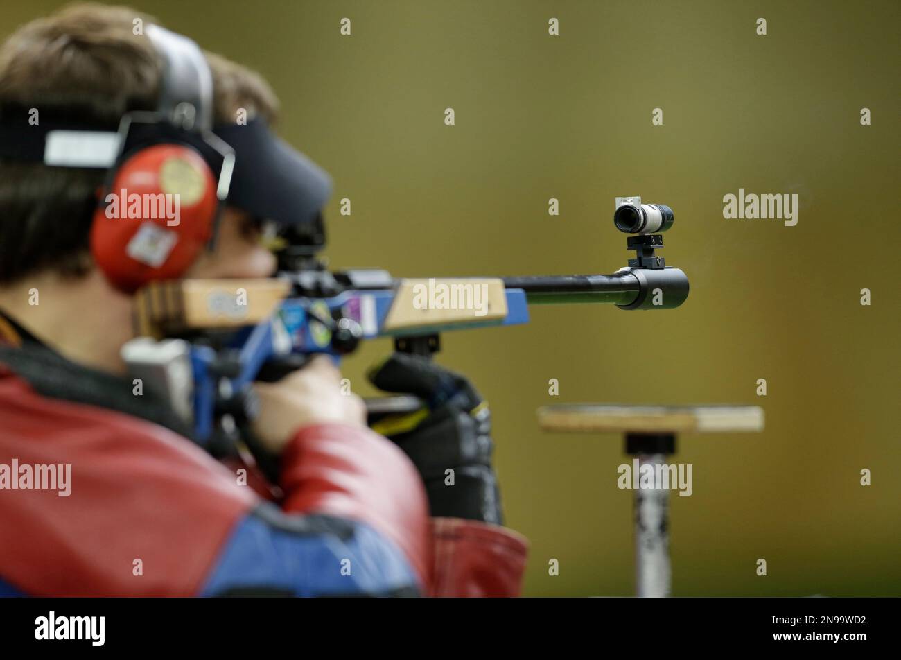 Belarus' Yury Shcherbatsevich shoots during the men's 50-meter rifle 3 ...