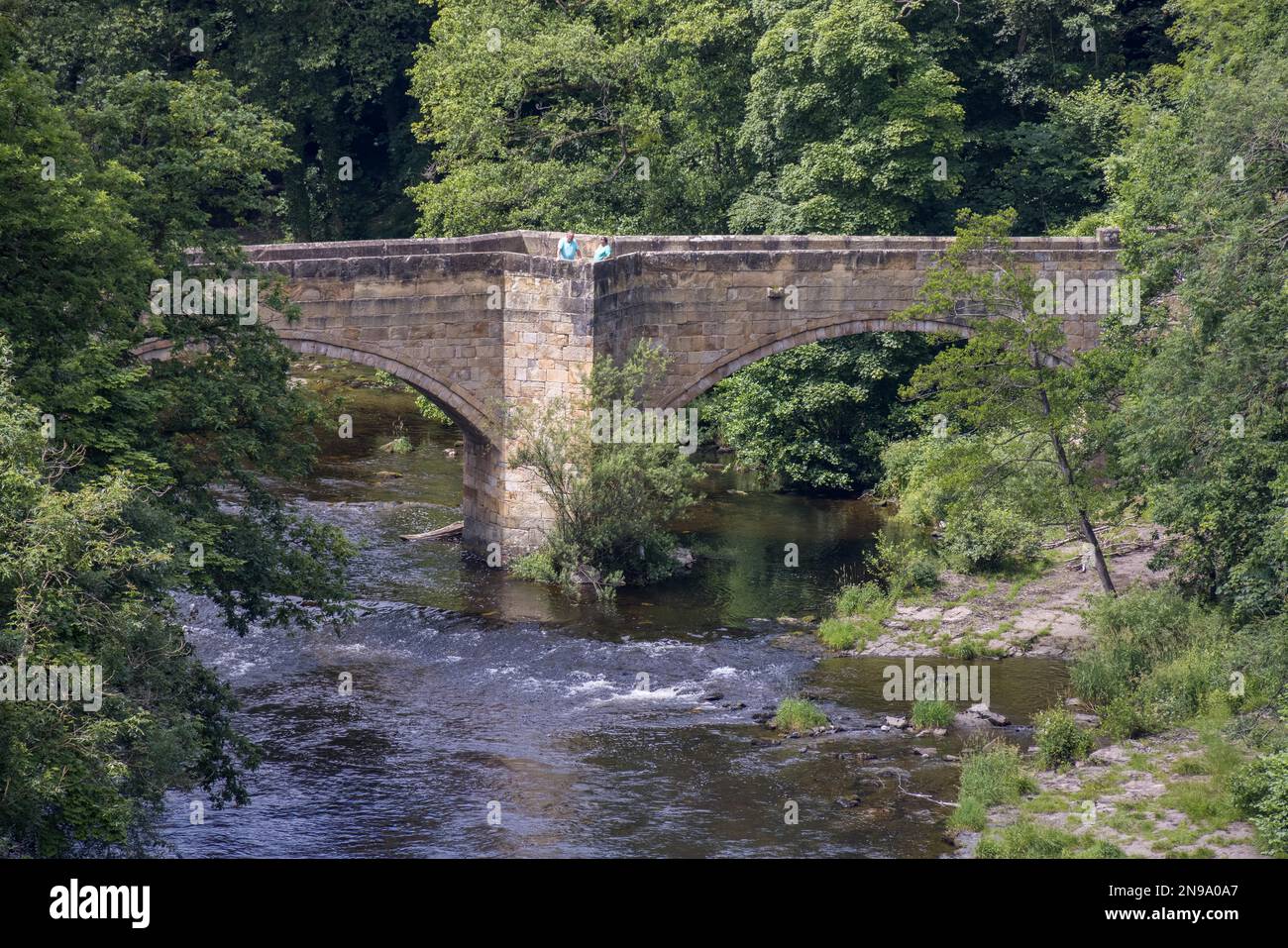 FRONCYSYLLTE, WREXHAM, WALES - JULY 15 : Stone bridge over the River ...