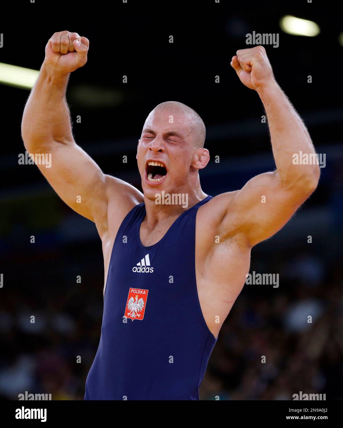 Damian Janikowski of Poland reacts after beating Melonin Noumonvi of ...