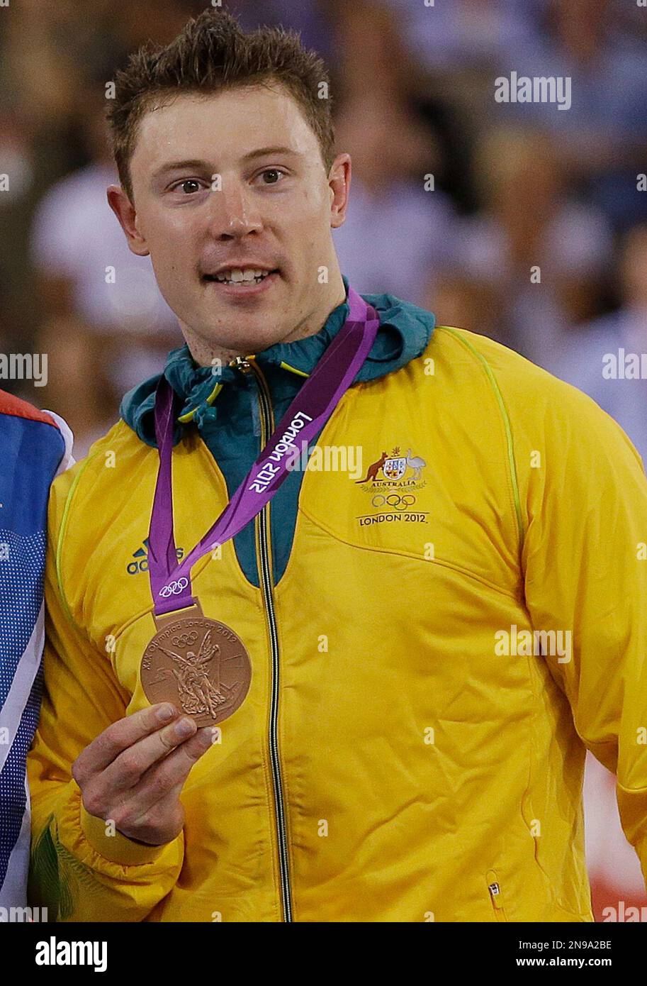 Bronze medalist Shane Perkins, of Australia, poses for photographs ...