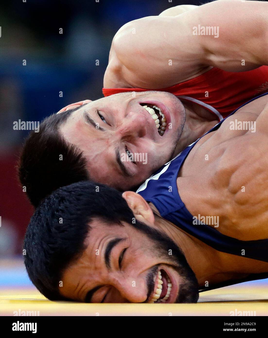 Hasan Aliyev of Azerbaijan competes against Zaur Kuramagomedov of ...