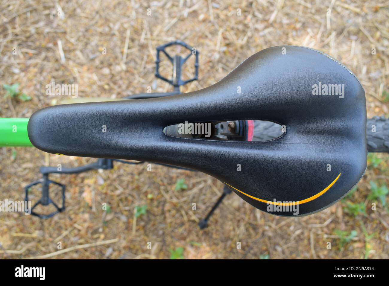 Bicycle seat, bicycle saddle on ground background. With top angle Stock ...