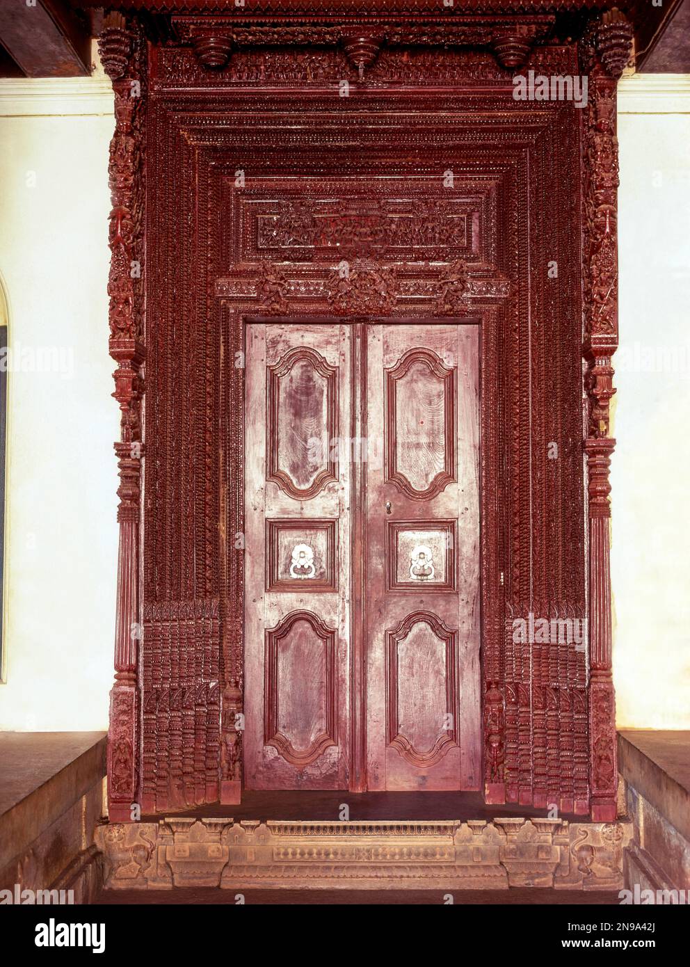 The Portal of a Nagarathar house, exquisitely carved teak wood in a ...