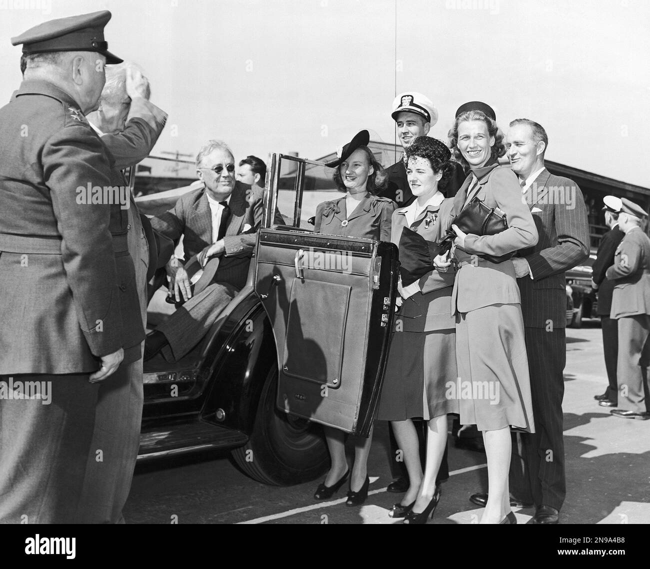 Members of the President Franklin Roosevelt's family gather around his ...