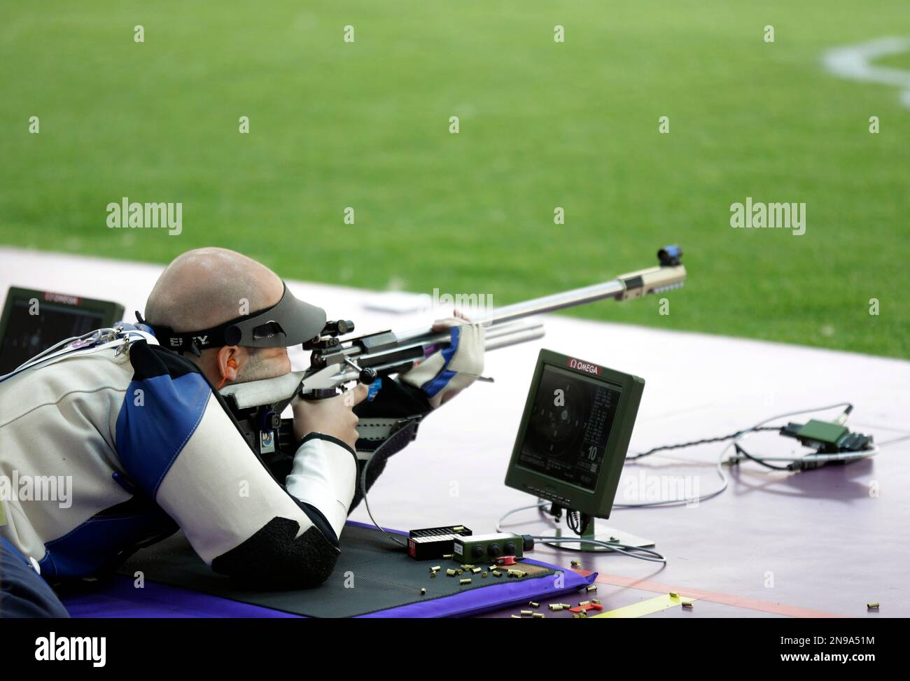 Italy's Niccolo Campriani shoots in prone position during qualifiers ...