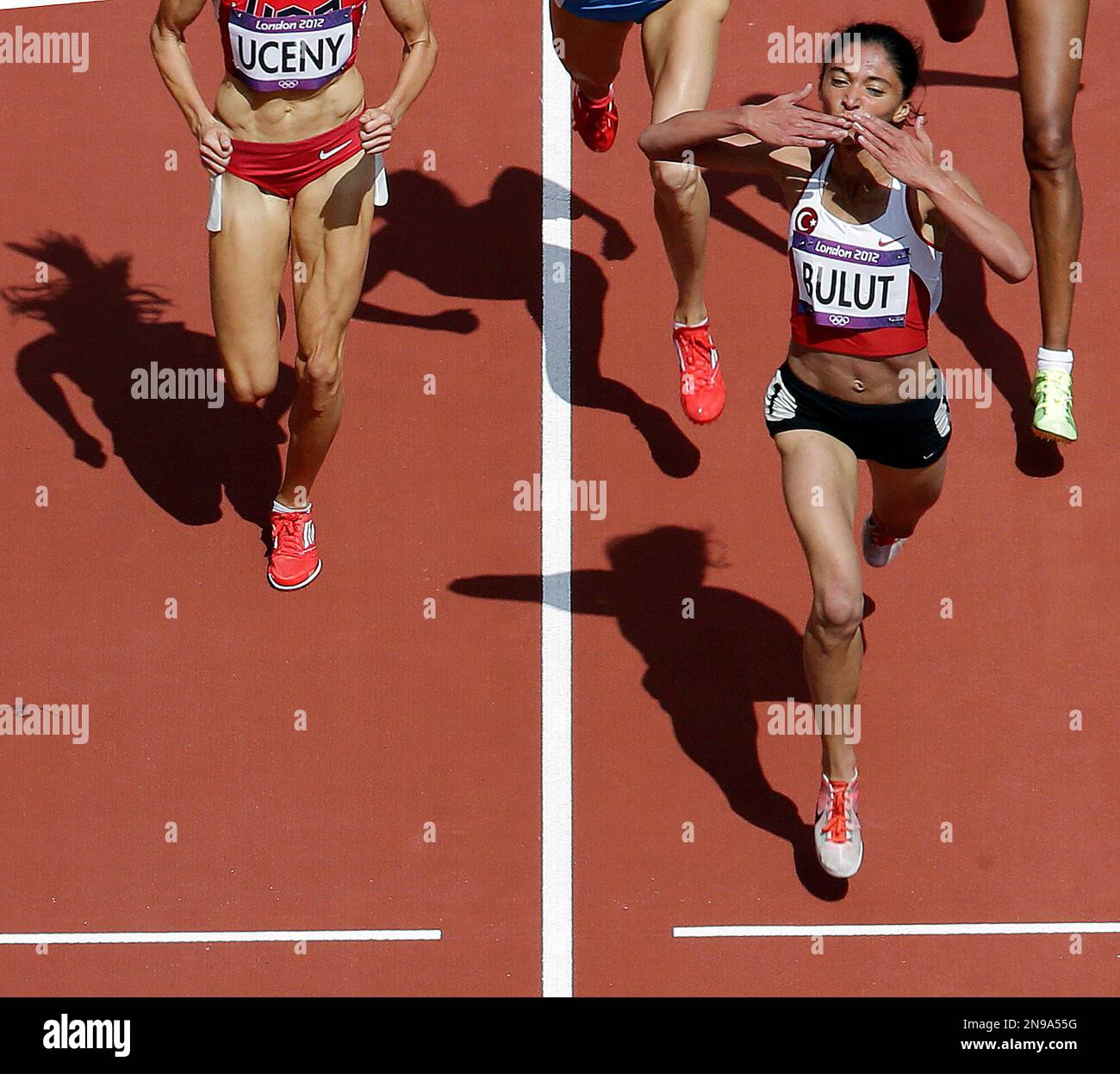 Turkey's Gamze Bulut reacts as she wins her heat during a women's 1500 ...