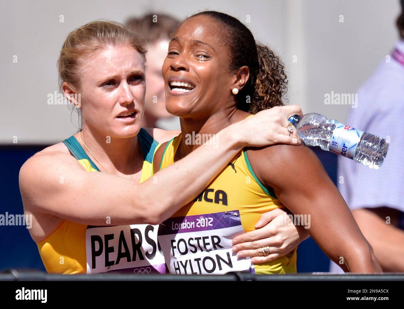 Jamaica's Brigitte Foster-Hylton is consoled by Australia's Sally ...