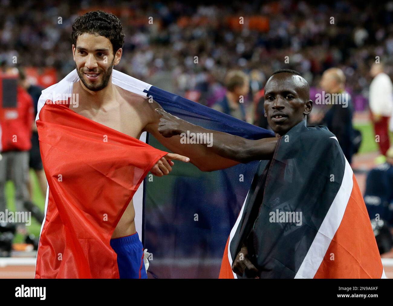 Kenya's winner Ezekiel Kemboi, right, and France's Mahiedine Mekhissi ...