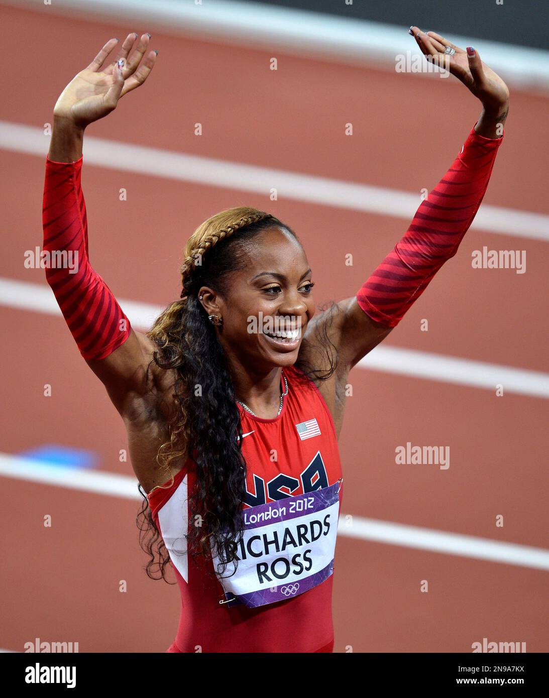 United States' Sanya Richards-Ross celebrates her win in the women's ...