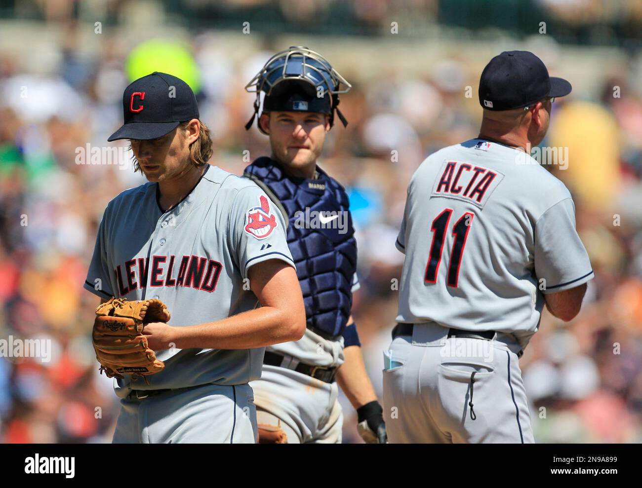Cleveland Indians starting pitcher Chris Seddon, left, walks off the ...